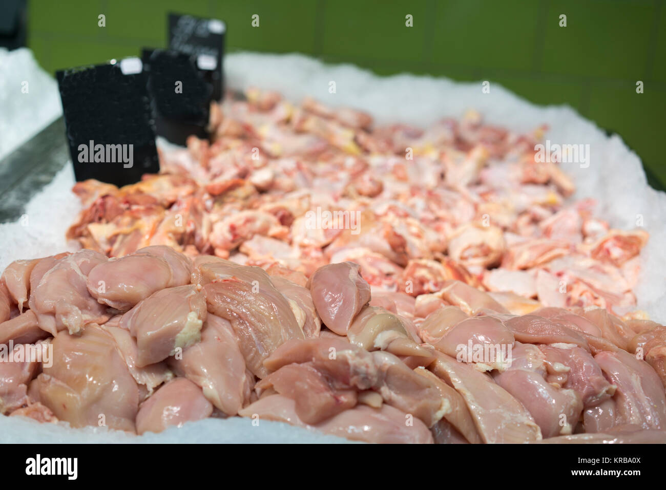 Raw chicken drumsticks in a supermarket package Stock Photo - Alamy