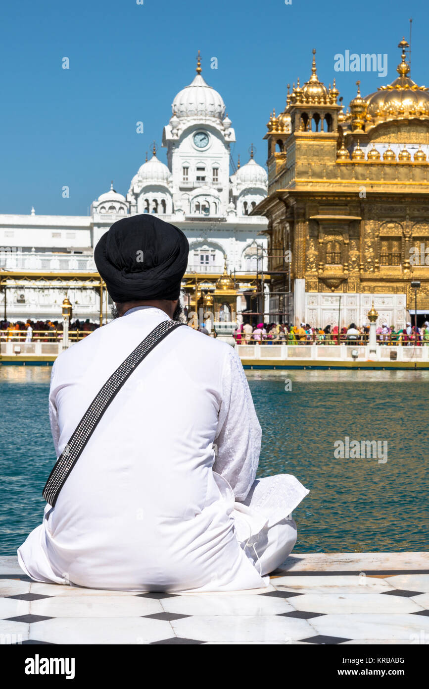 Vertical picture of Sikh man wearing traditional black turban at Sri ...