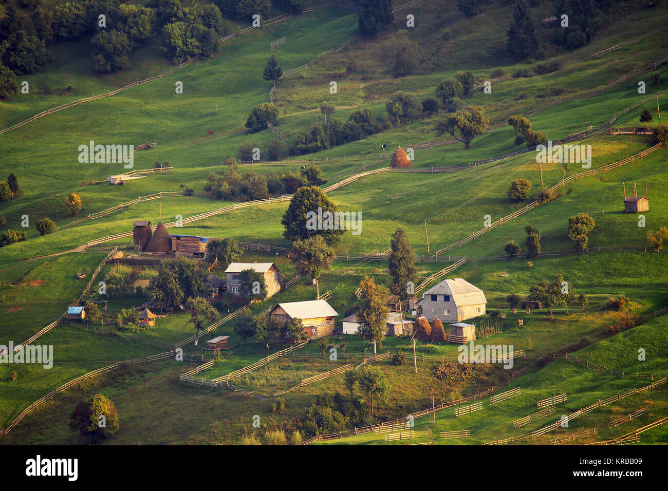 September rural scene in mountains. Authentic village and fence Stock ...