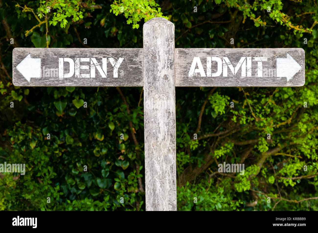 DENY versus ADMIT directional signs Stock Photo - Alamy