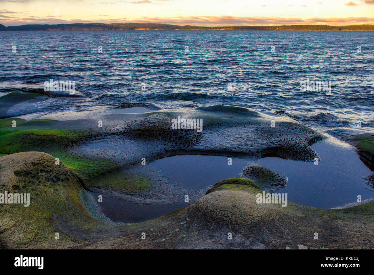 Scenic sunset view of the ocean overlooking the Strait of Georgia from ...