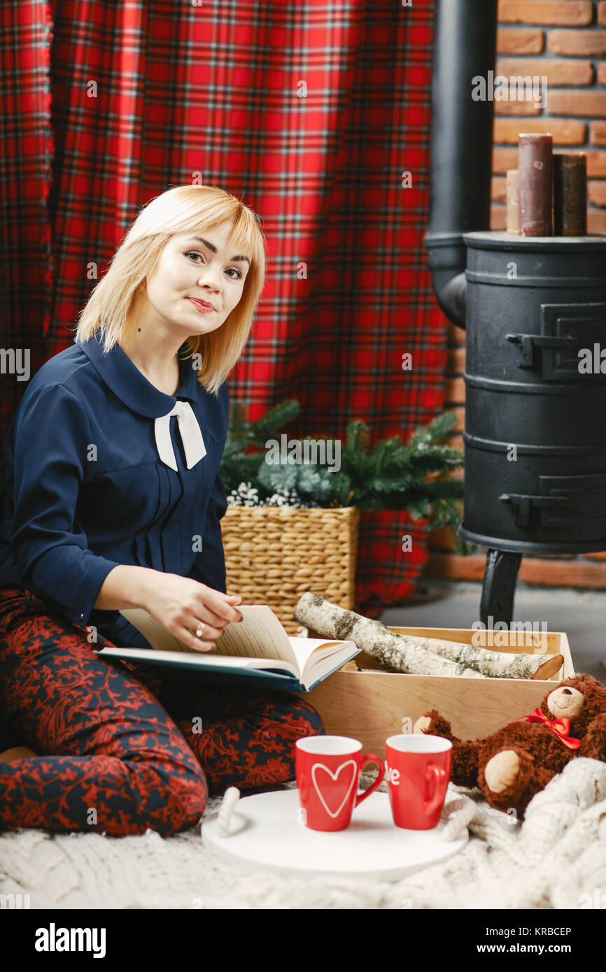 Pretty girl reading a book Stock Photo - Alamy