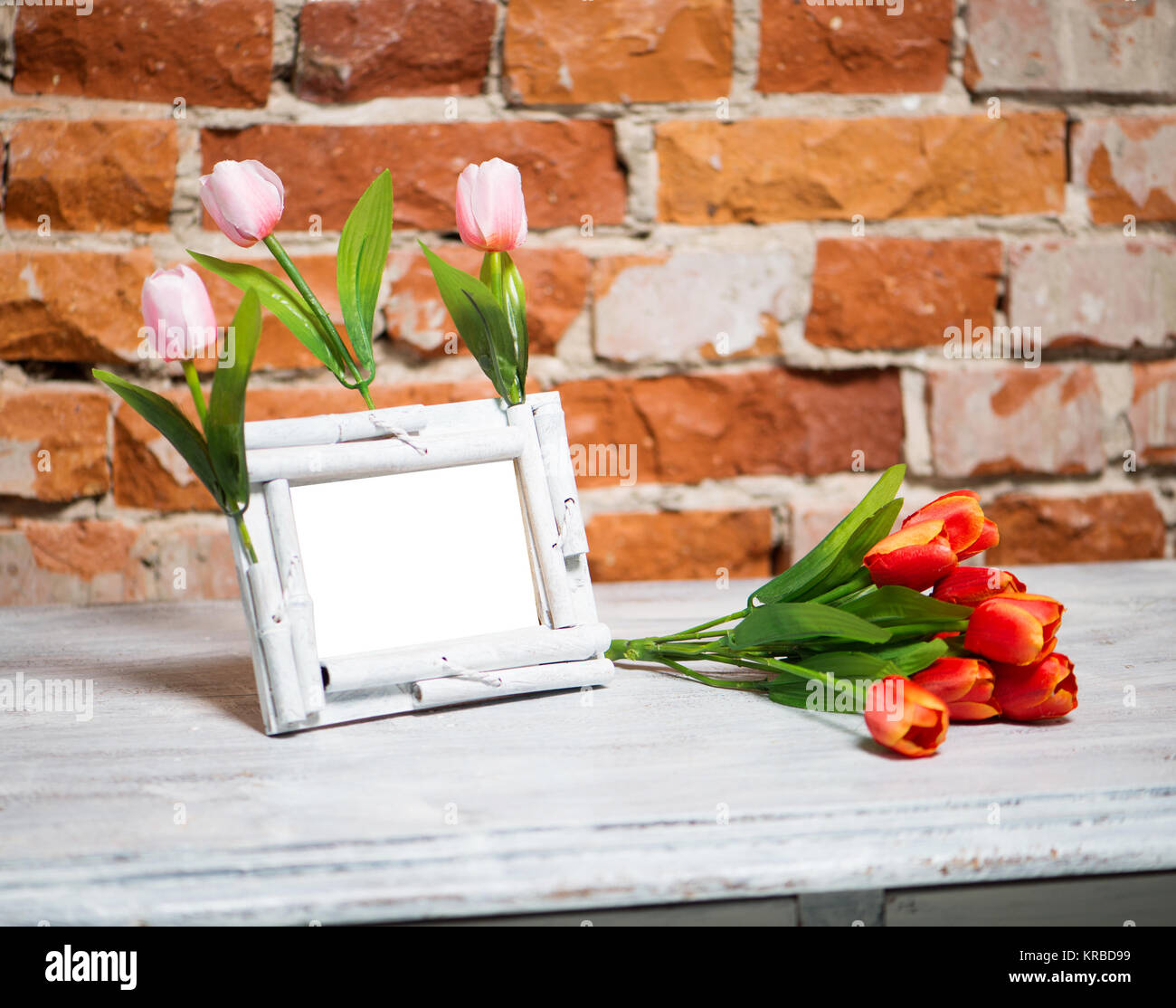 photo frame with bouquet of tulips Stock Photo - Alamy