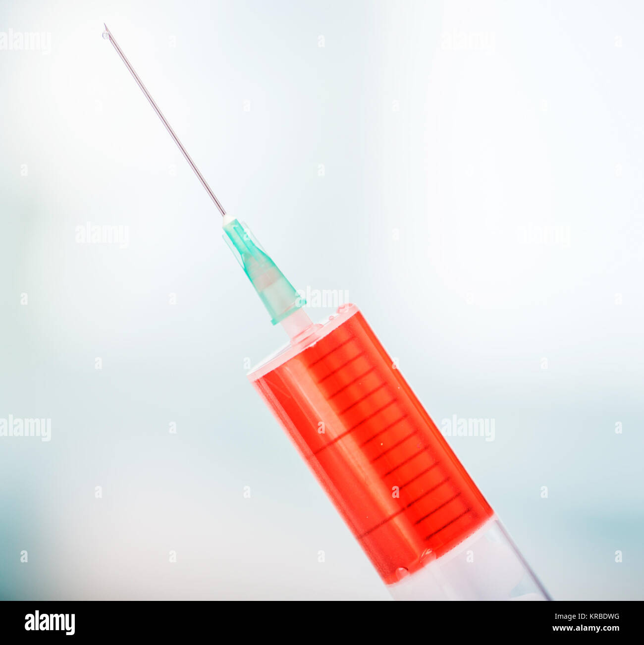 syringe with red drug Stock Photo - Alamy