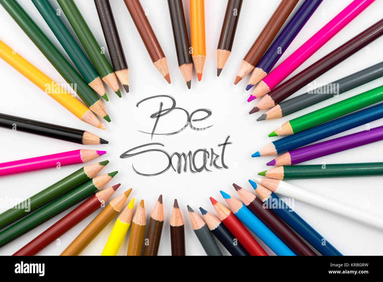 Colouring pencils in circle arrangement with message Be Smart Stock ...