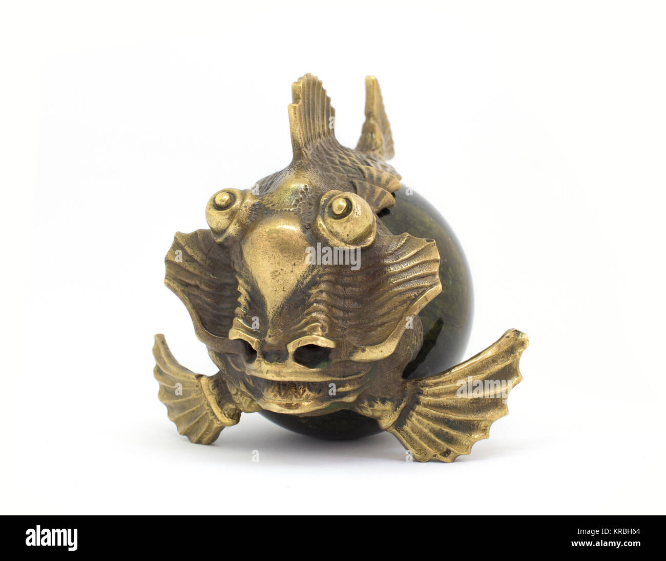 Bronze stone miniature antique fish isolated on white background Stock ...