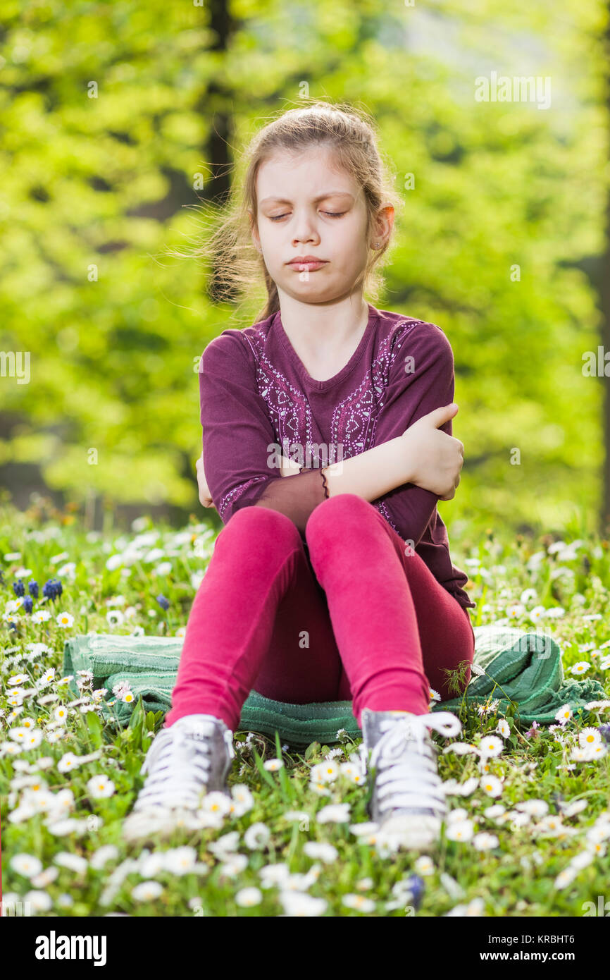 Portrait of angry child in park Stock Photo - Alamy