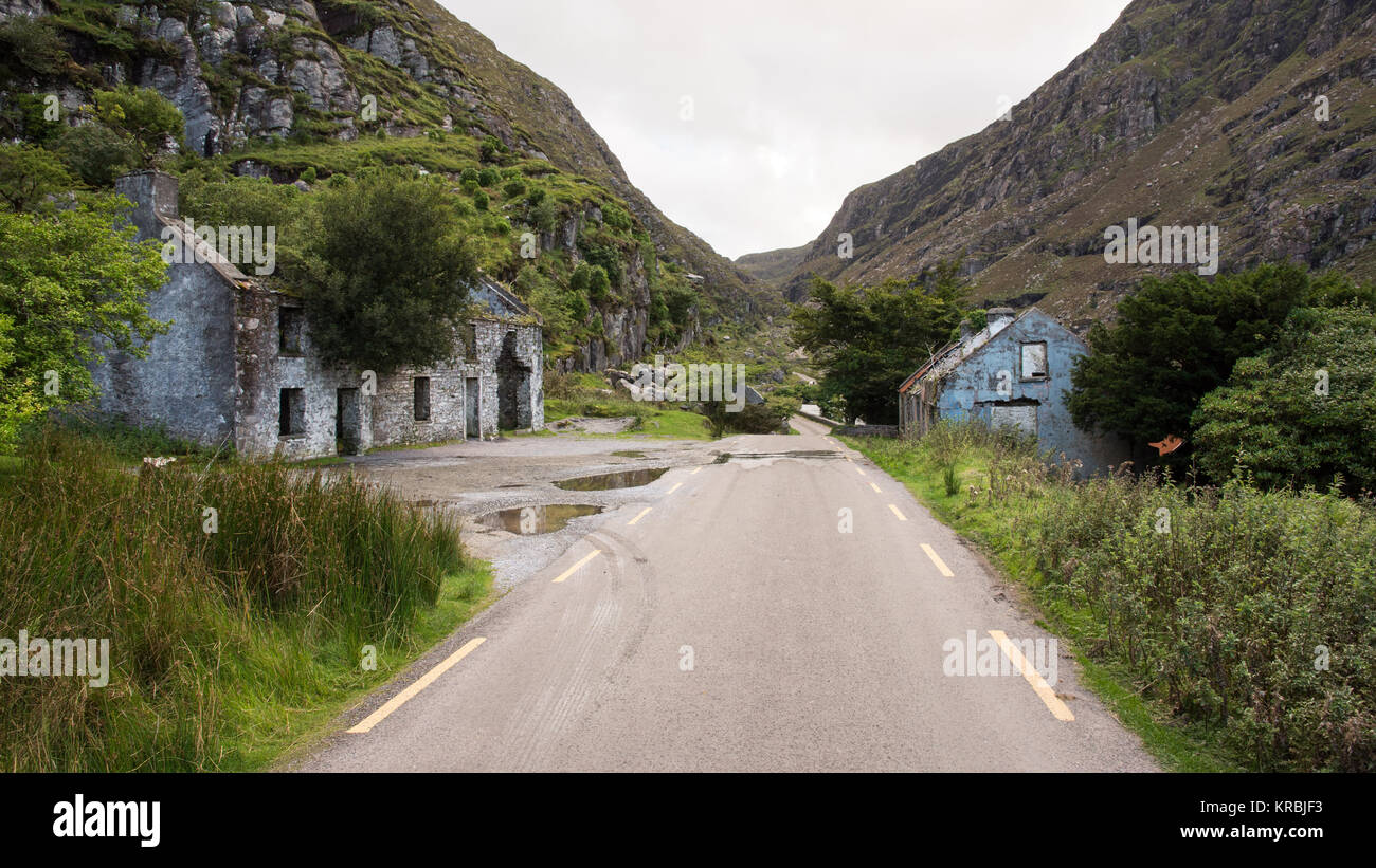 Ruined cottages beside the mountain pass road at Augher Lake in the Gap ...