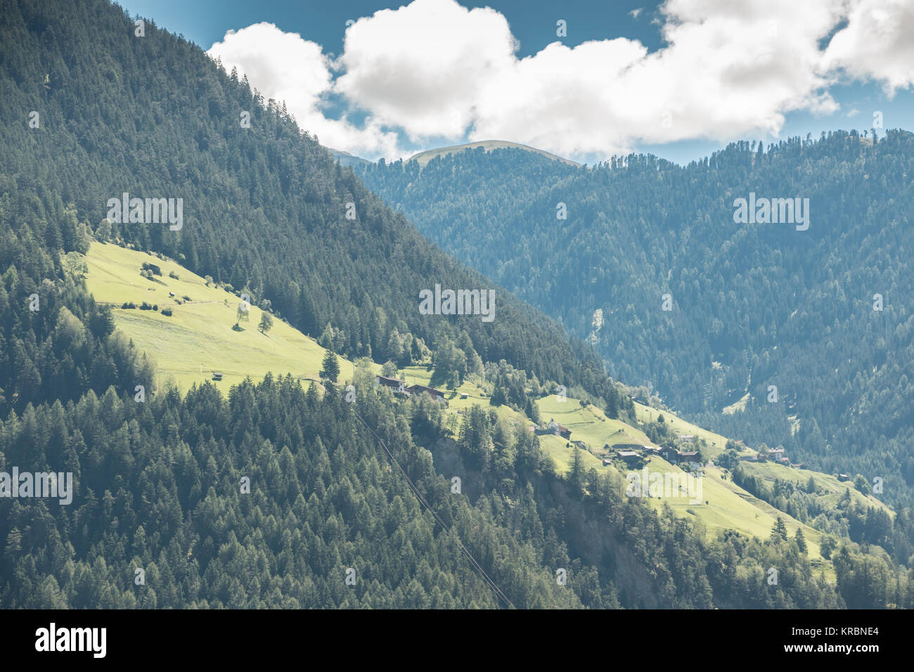 The mountains, green fields, meadows and forests Stock Photo - Alamy