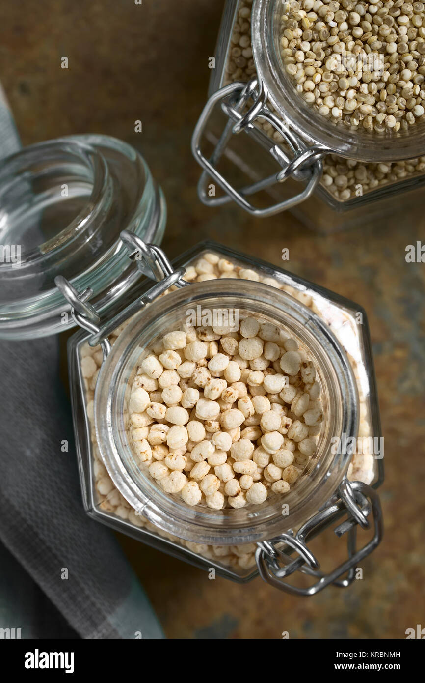 Popped Quinoa Cereal and Raw Quinoa Stock Photo - Alamy