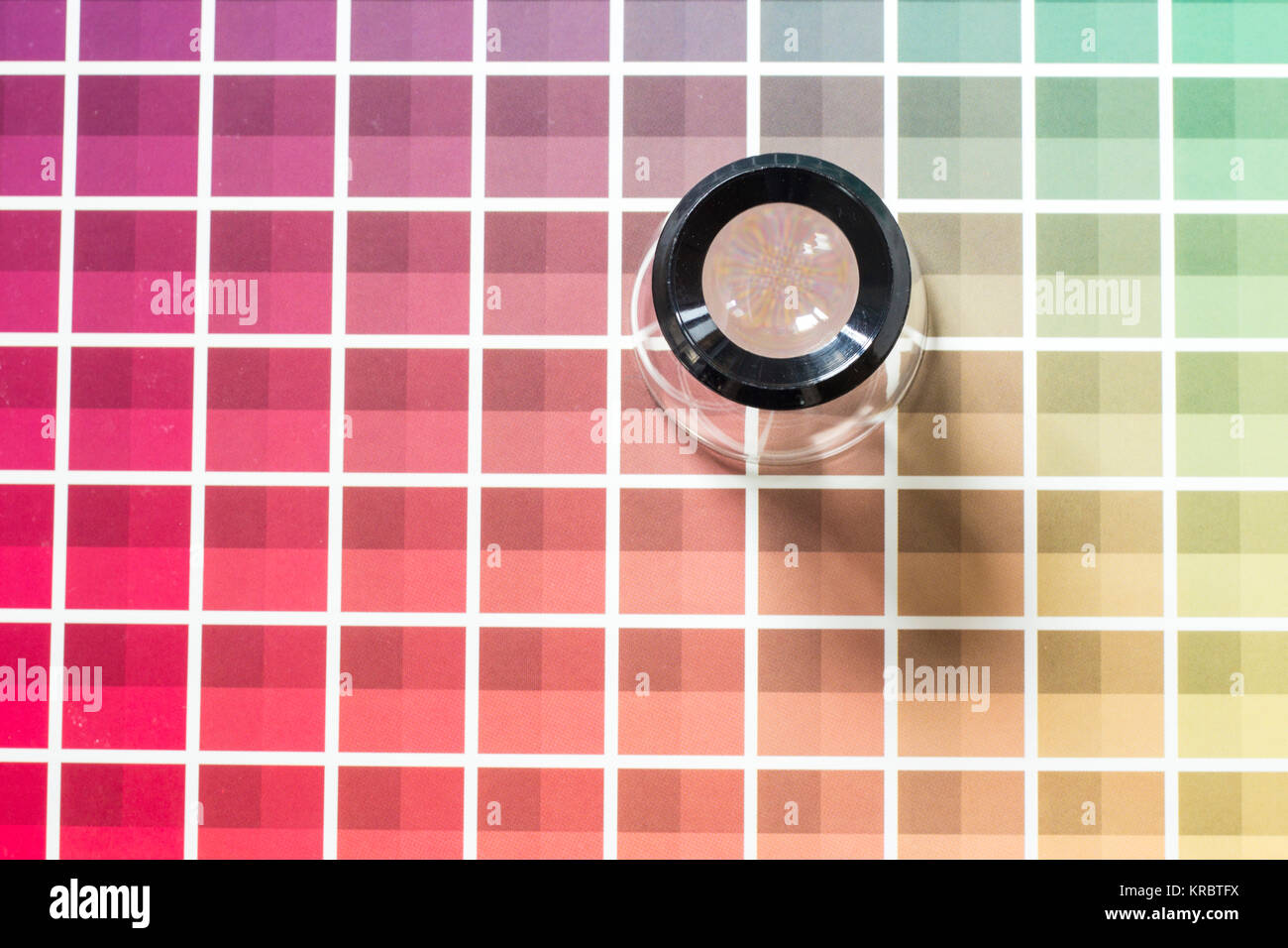 Magnifier on a color chart Stock Photo - Alamy