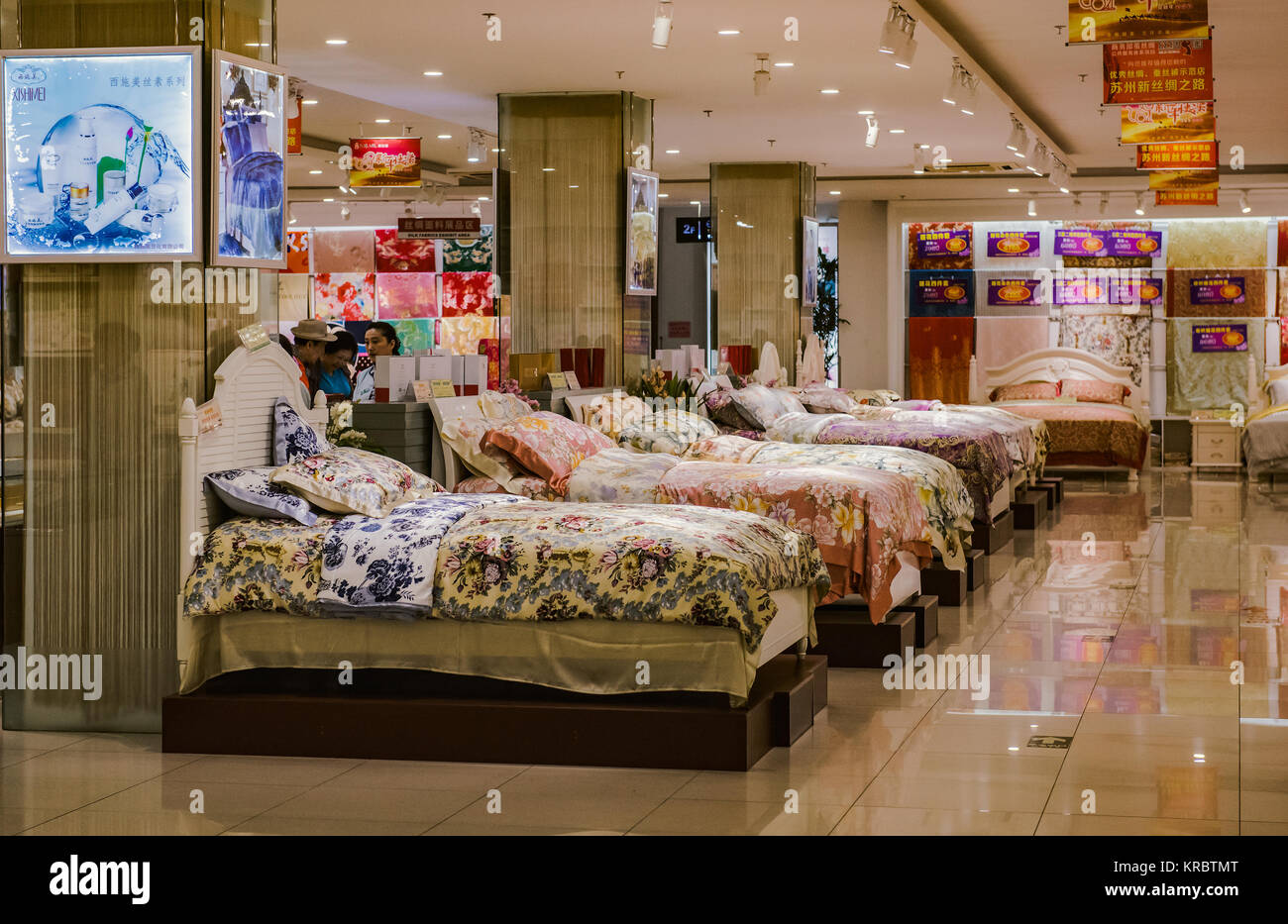 Suzhou, China - March 30, 2016: Popular silk articles in a big silk ...