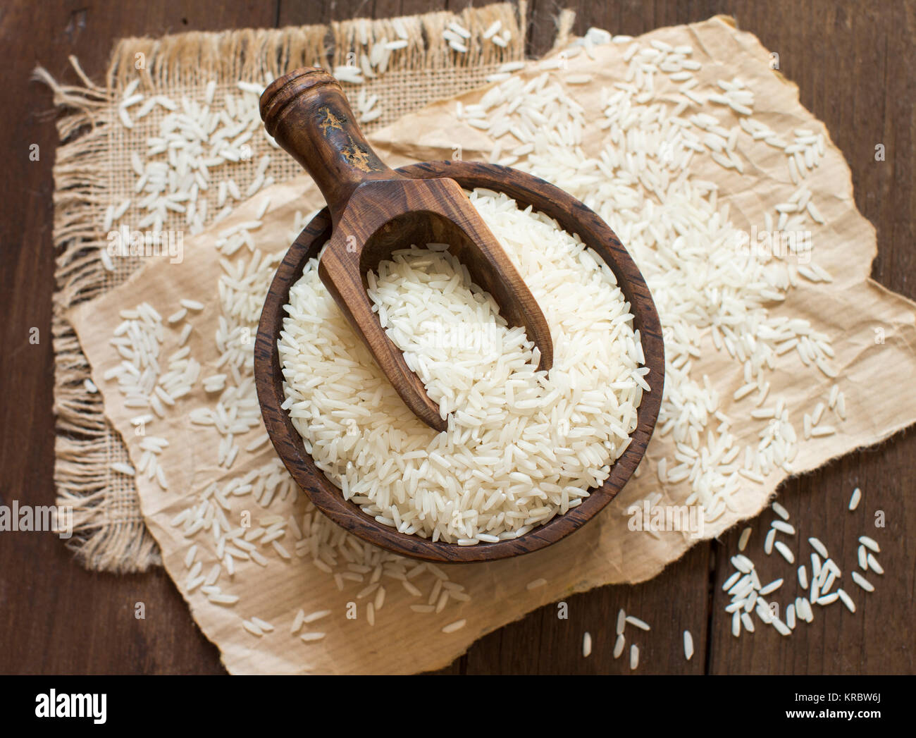 Pile of Basmati rice in a bowl with a spoon Stock Photo - Alamy