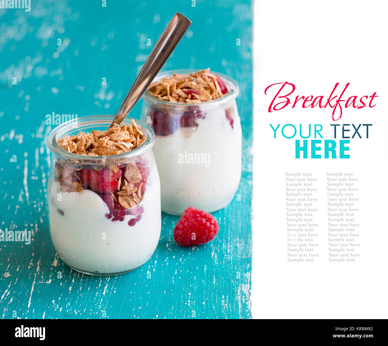 Raspberries, flakes and fresh yogurt in a jar Stock Photo - Alamy
