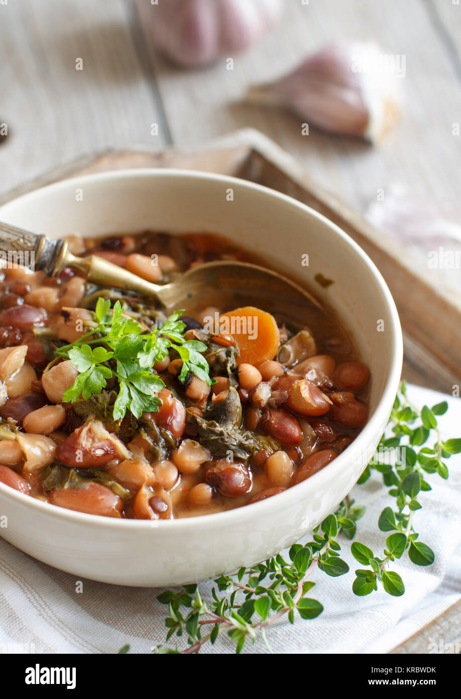 Cooked legumes and vegetables in a bowl Stock Photo - Alamy