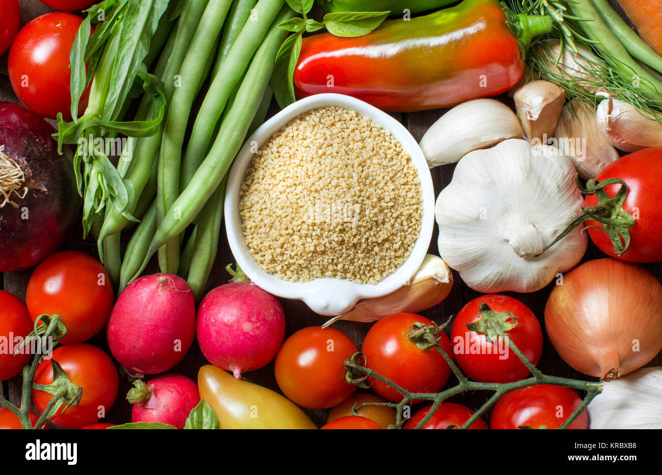 CousCous in a bowl and fresh vegetables Stock Photo - Alamy