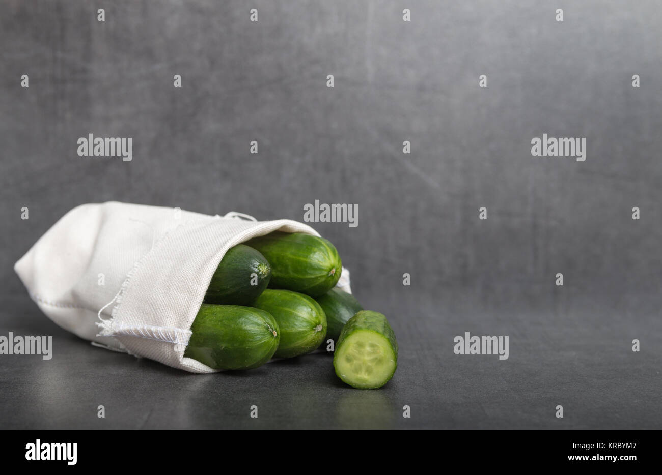 mini cucumber in a bag Stock Photo - Alamy