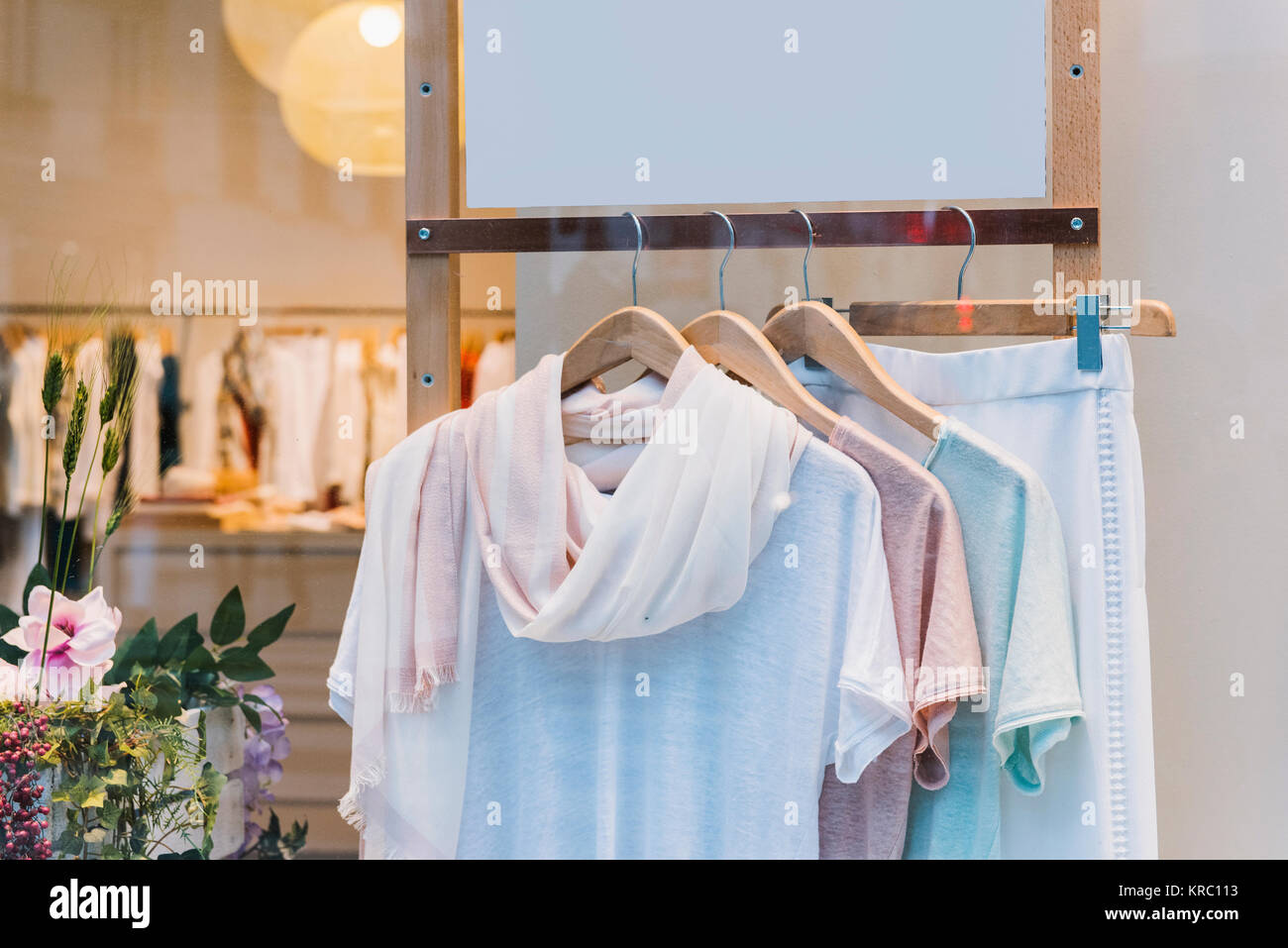Fashionable clothes in a boutique store in Paris Stock Photo - Alamy