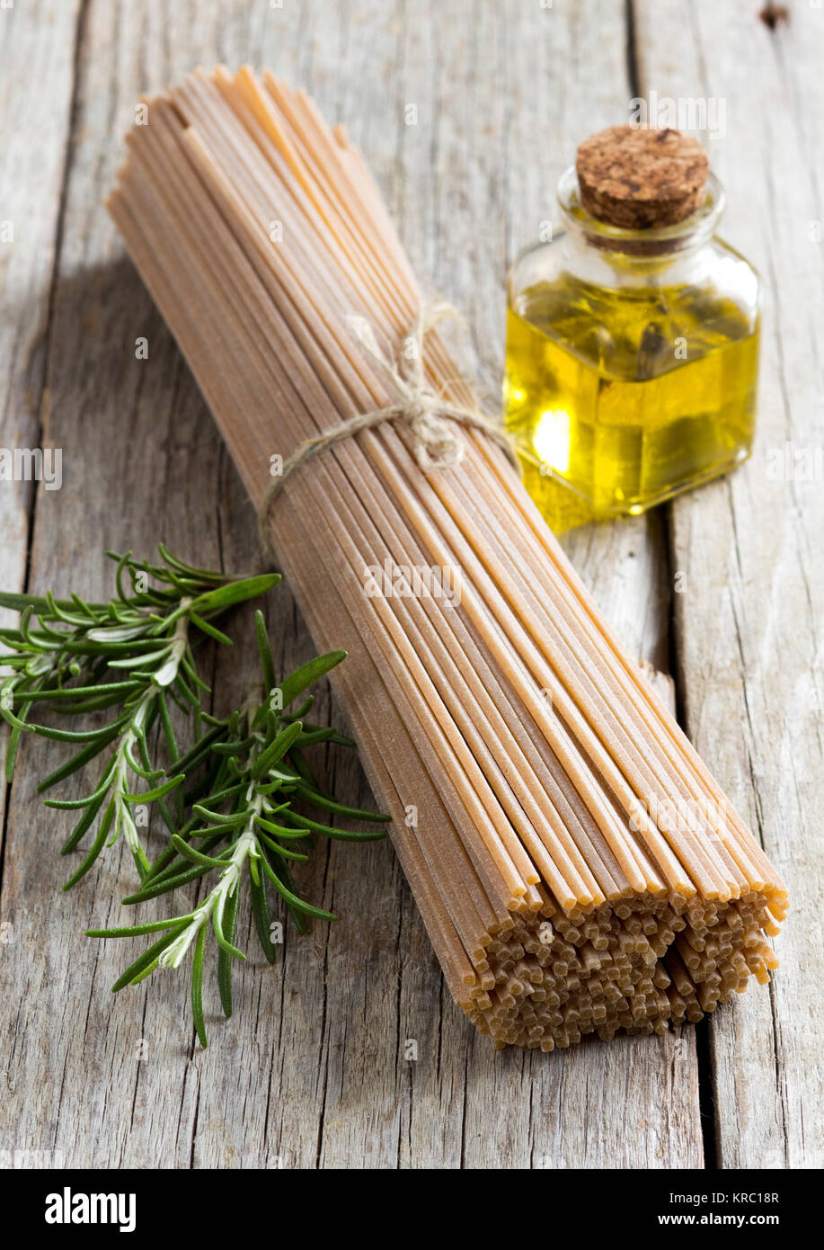 Whole wheat spaghetti, olive oil and rosemary Stock Photo - Alamy