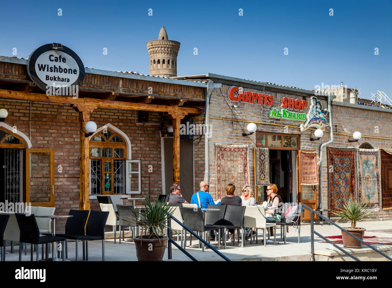 People Sitting Outside The Wishbone Cafe, Bukhara, Uzbekistan Stock ...