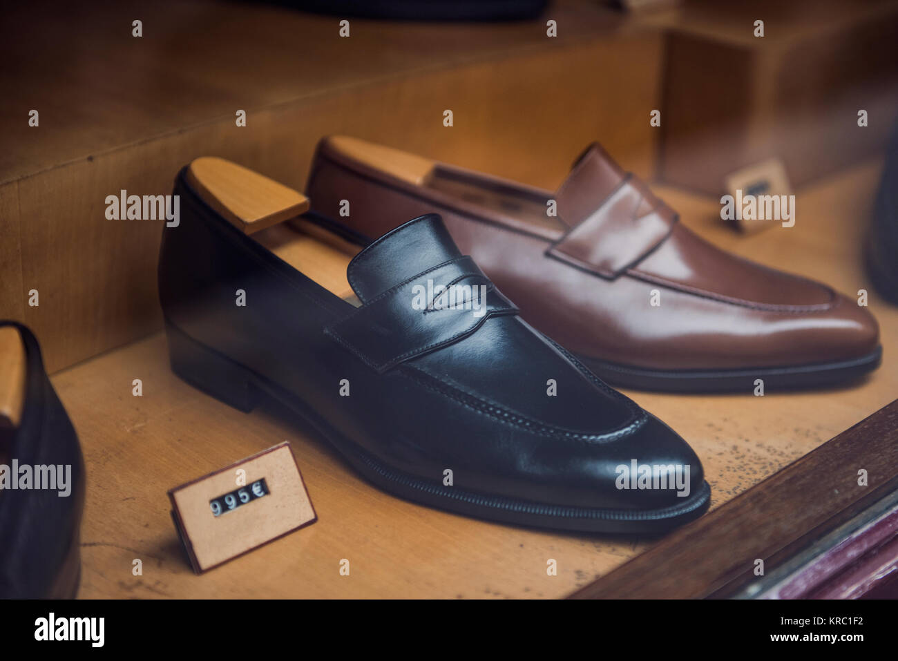 Elegant men shoes in a store in Paris Stock Photo - Alamy
