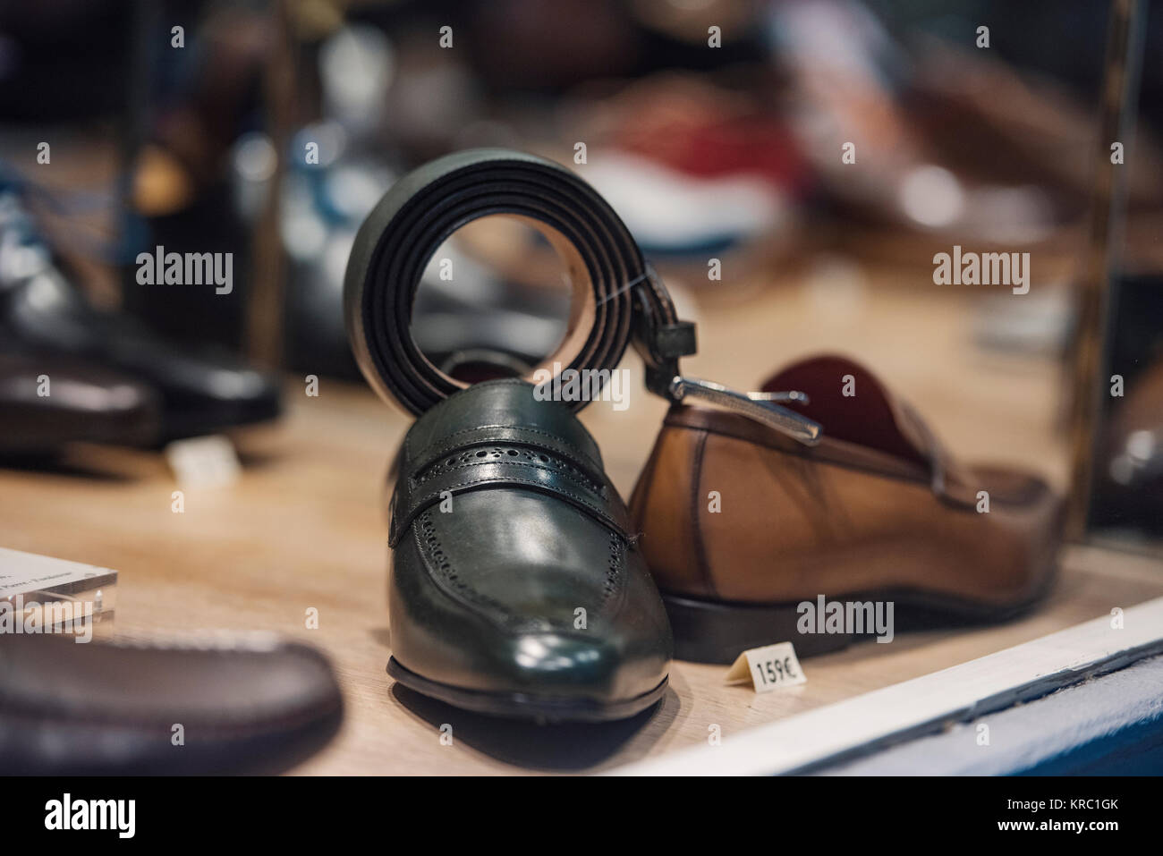 Elegant men shoes in a store in Paris Stock Photo - Alamy