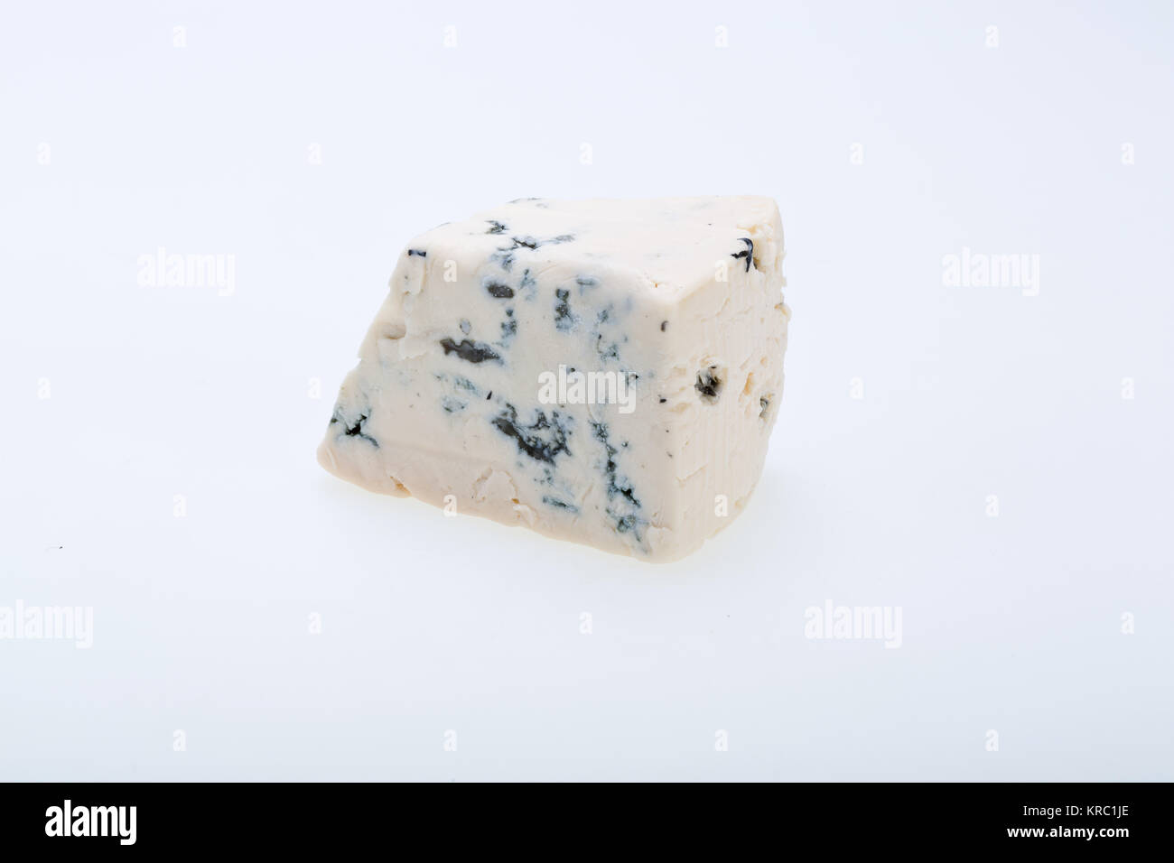 piece of blue cheese on white background Stock Photo - Alamy