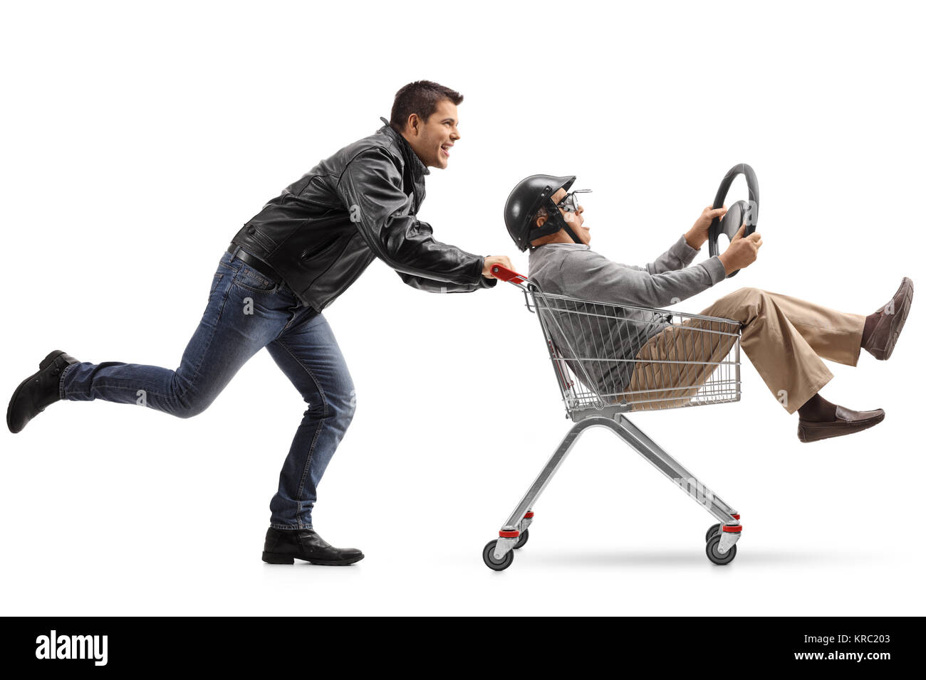 Biker pushing a shopping cart with a mature man with a helmet and a ...