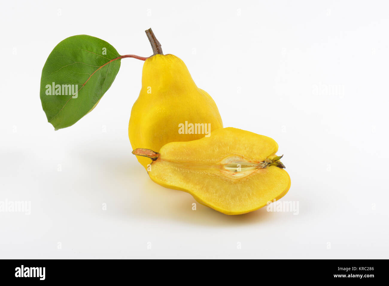 one and half yellow pears Stock Photo - Alamy