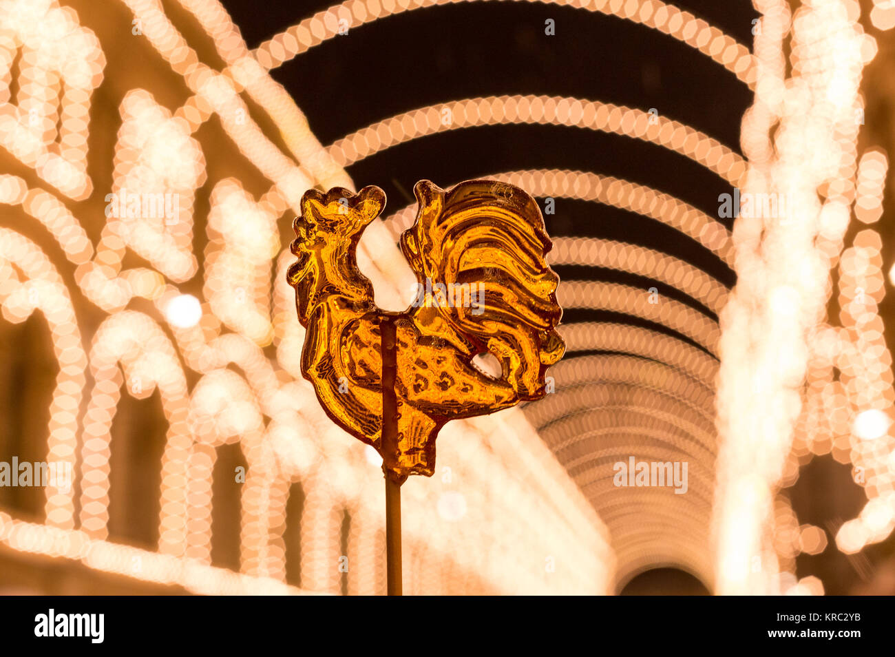 Cockerel candy on a stick. Hard candy rooster. Rooster candy symbol ...