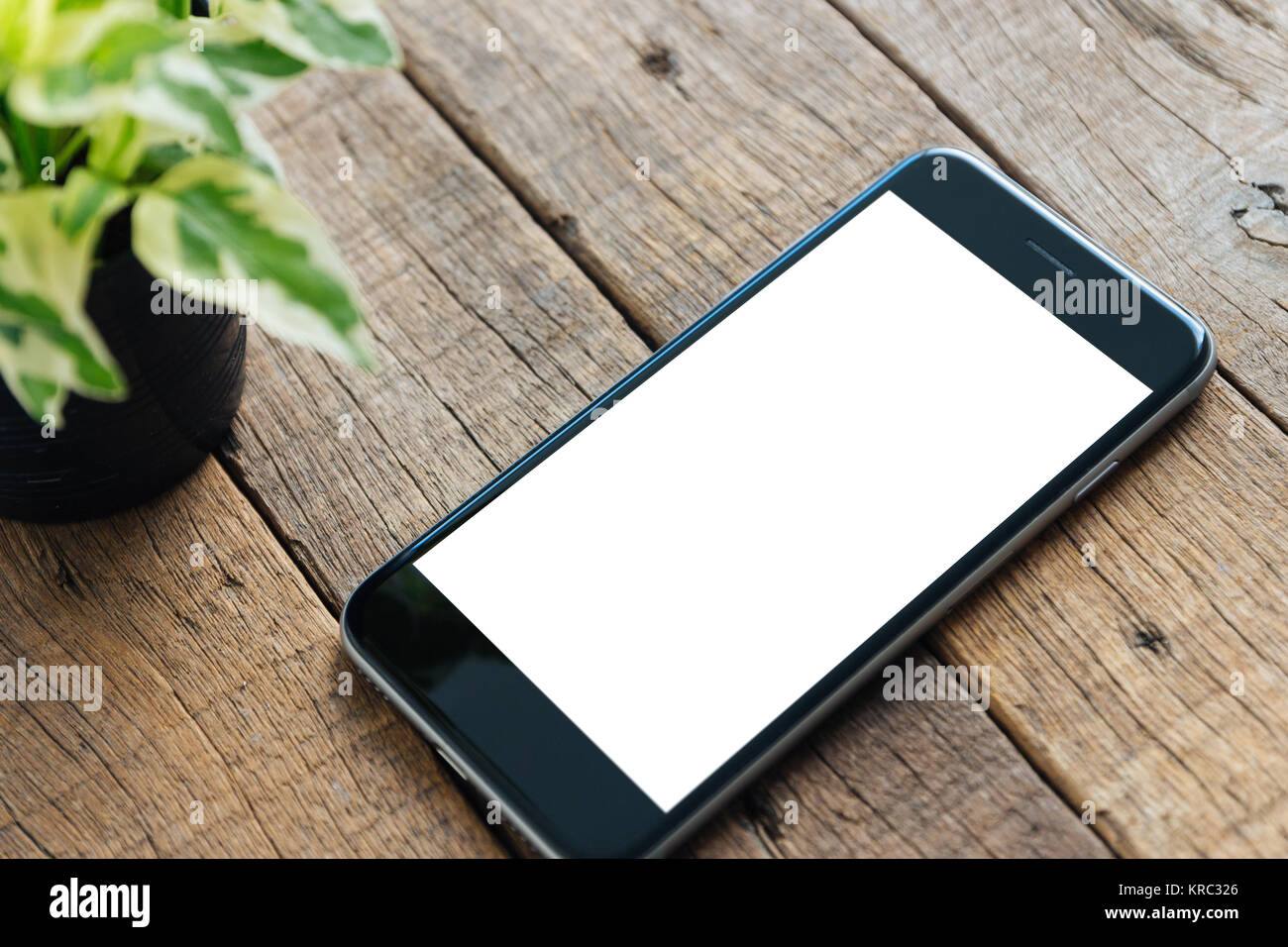 close up phone white screen on wood desk Stock Photo - Alamy
