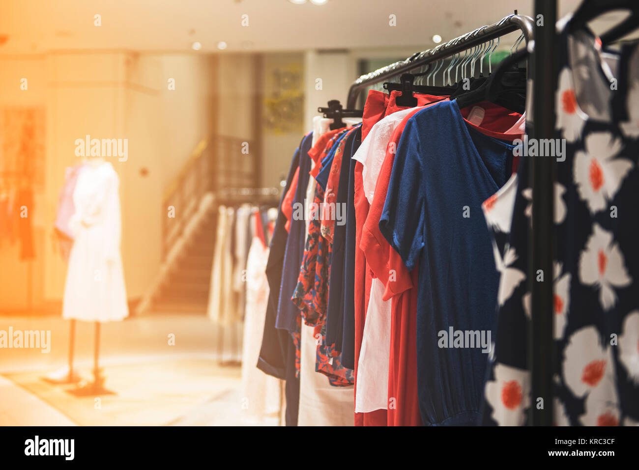 Women clothes in front with store background in Paris Stock Photo - Alamy