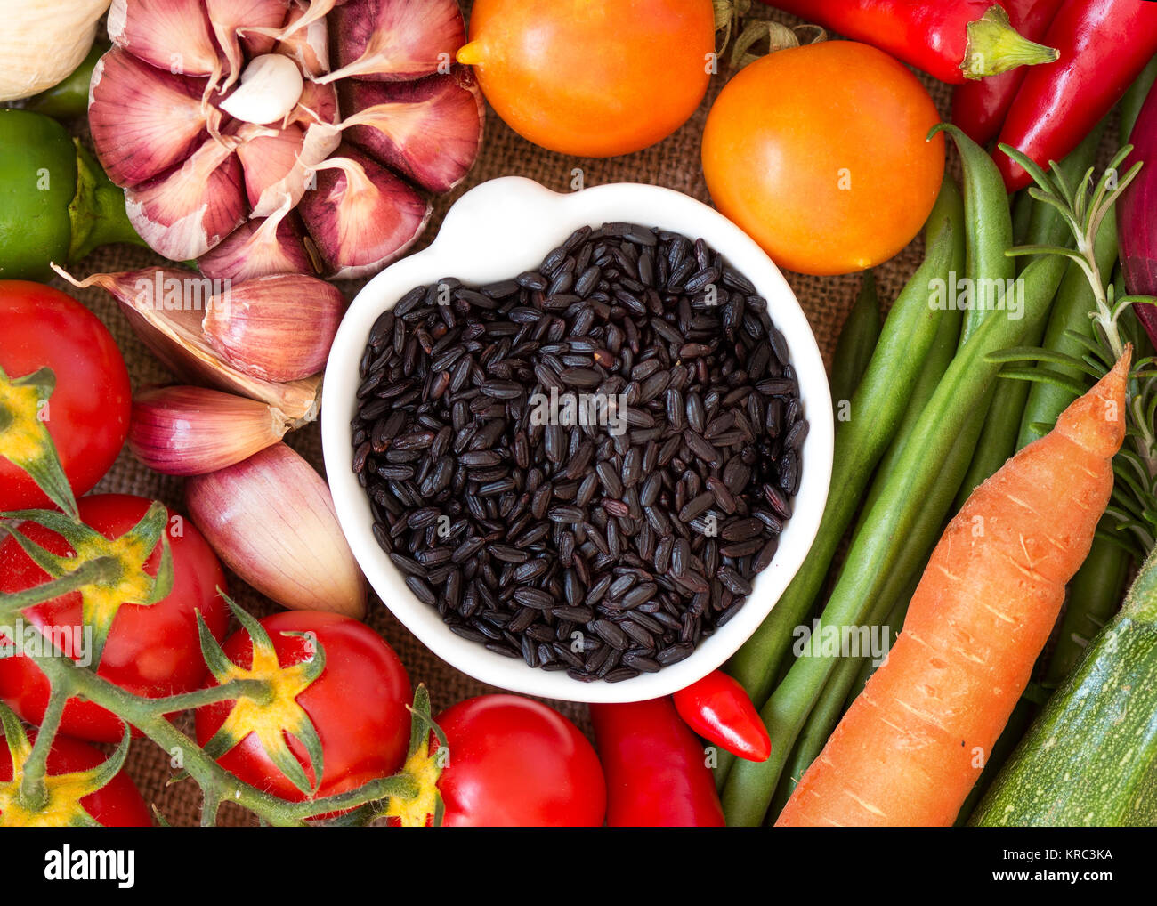 Black organic rice and vegetables Stock Photo - Alamy