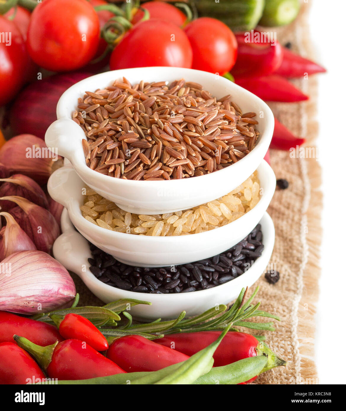 Red, black and unpolished organic rice and vegetables Stock Photo - Alamy