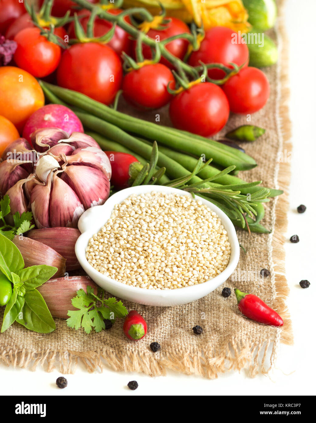 Raw organic quinoa and vegetables Stock Photo - Alamy