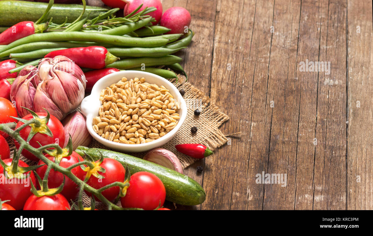 Whole wheat and vegetables Stock Photo - Alamy