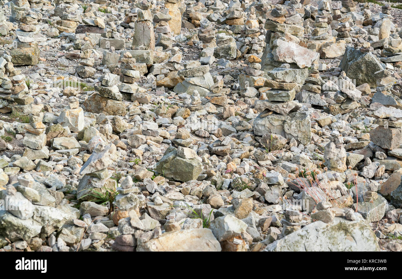 lots of small stacked stone piles at the Crozon peninsula around Pointe ...