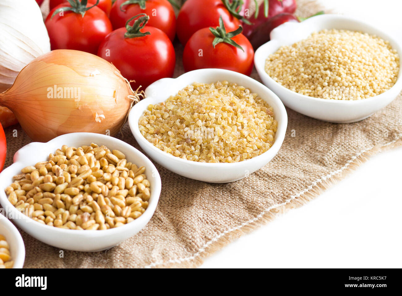 Millet, spelt, bulgur and vegetables Stock Photo - Alamy