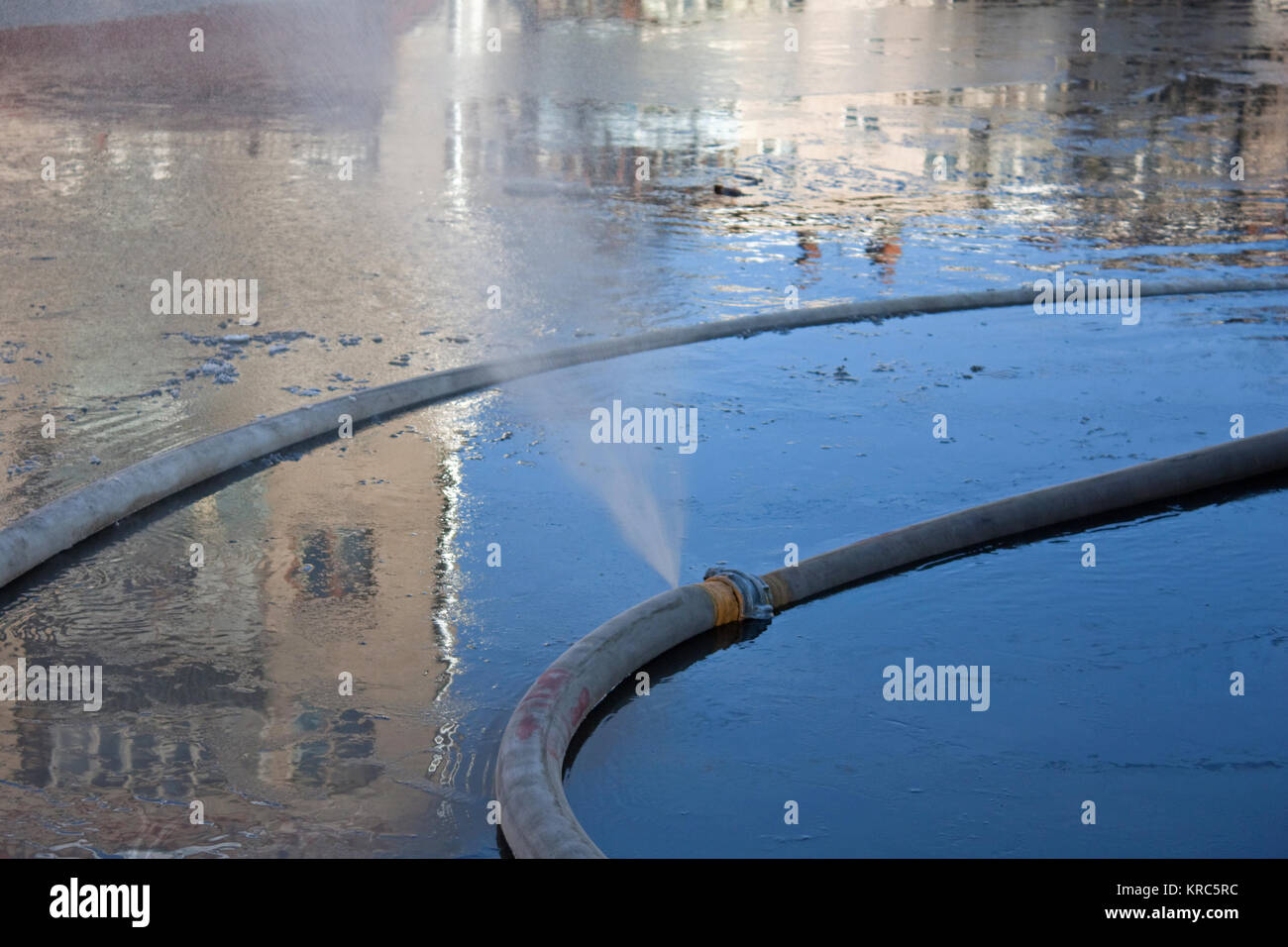 Emergency service fire hose safety water valve Stock Photo - Alamy