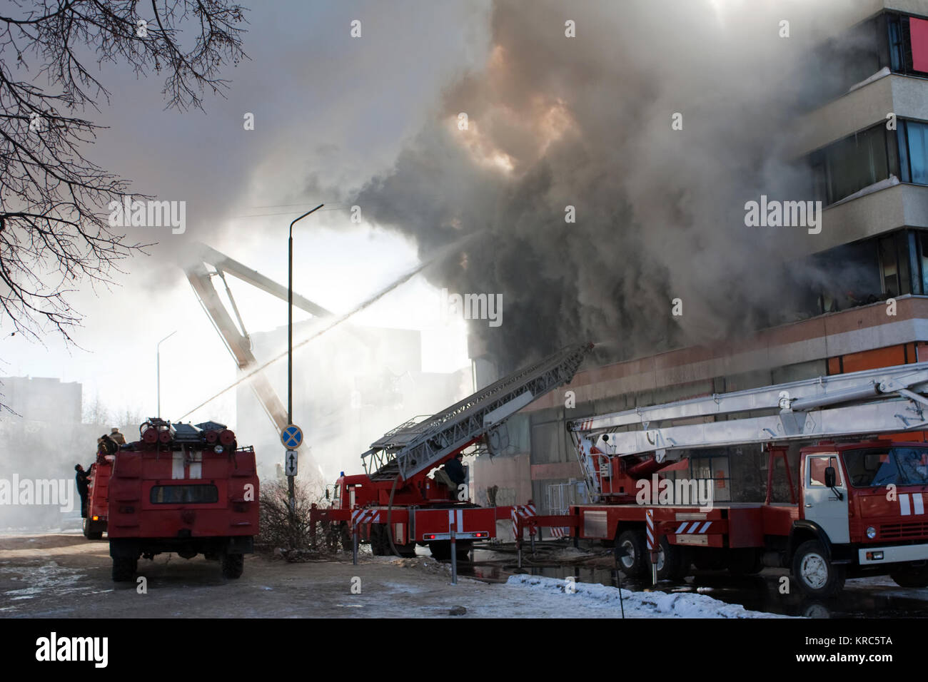 Burning fire smoke firefighter emergency service Stock Photo - Alamy