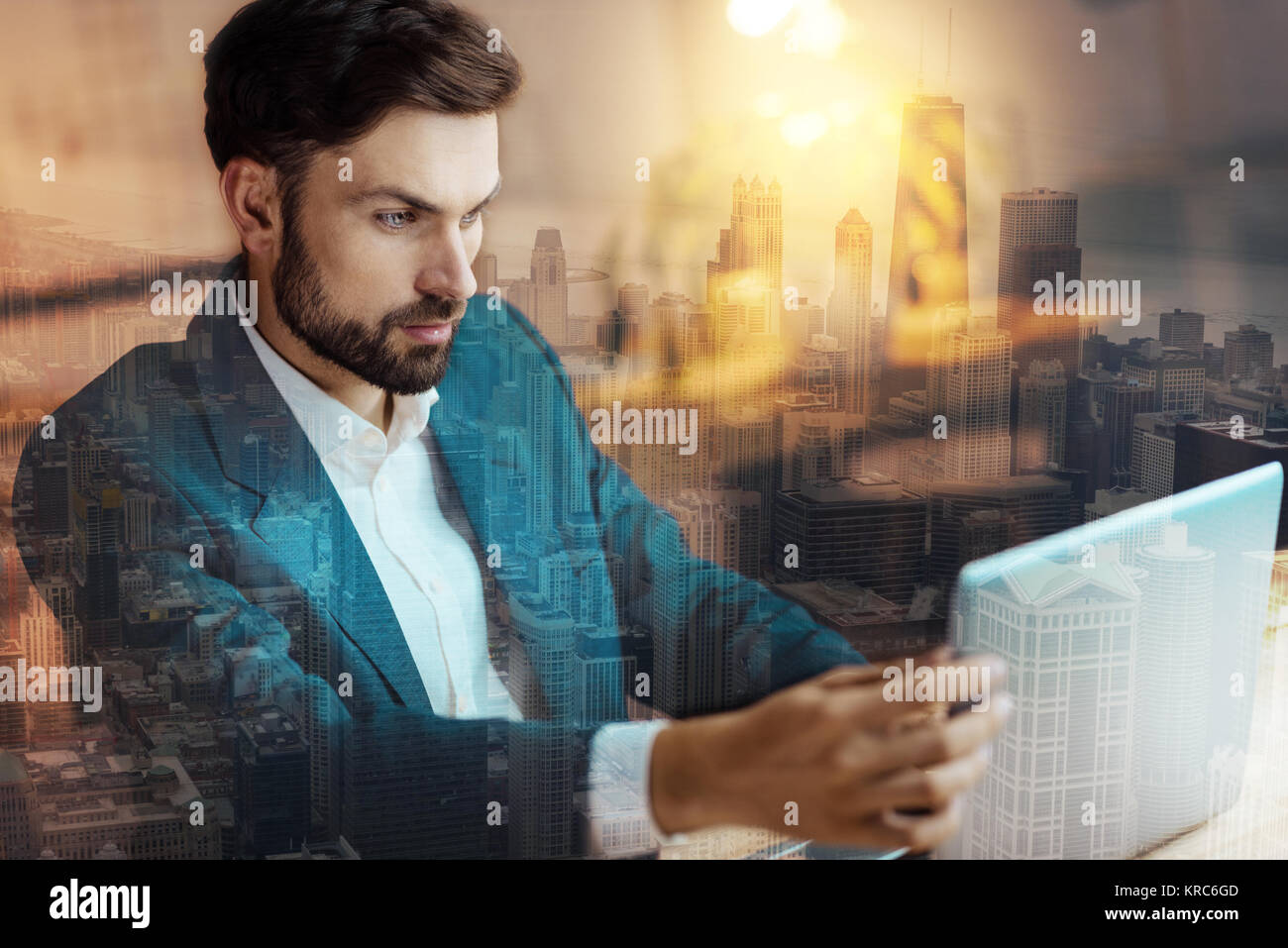 Bristled man adjusting the angle of laptop screen Stock Photo - Alamy