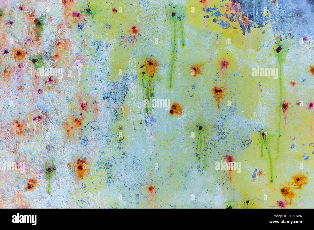 Paintball game arena old broken house wall with pelet sprayed paint ...