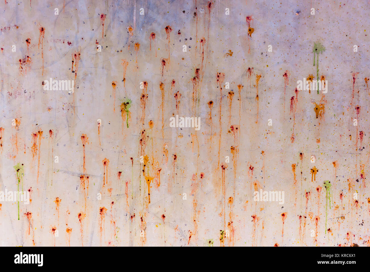 Paintball game arena old broken house wall with pelet sprayed paint ...