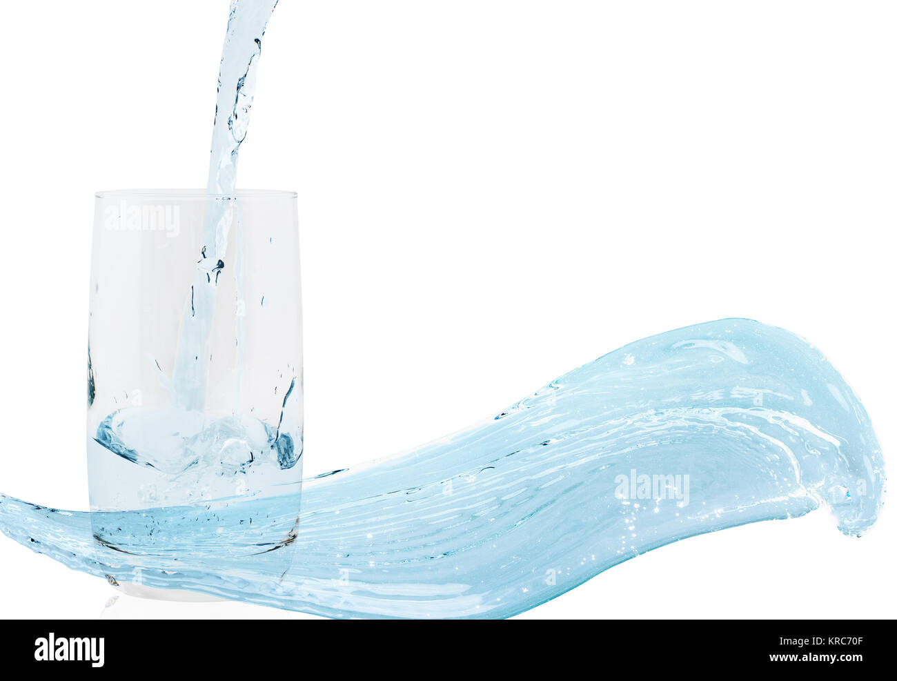 Pouring water into glass isolated on white background Stock Photo - Alamy