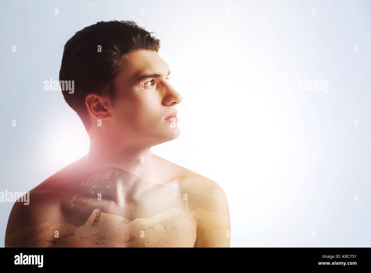 Handsome thoughtful man looking aside Stock Photo - Alamy