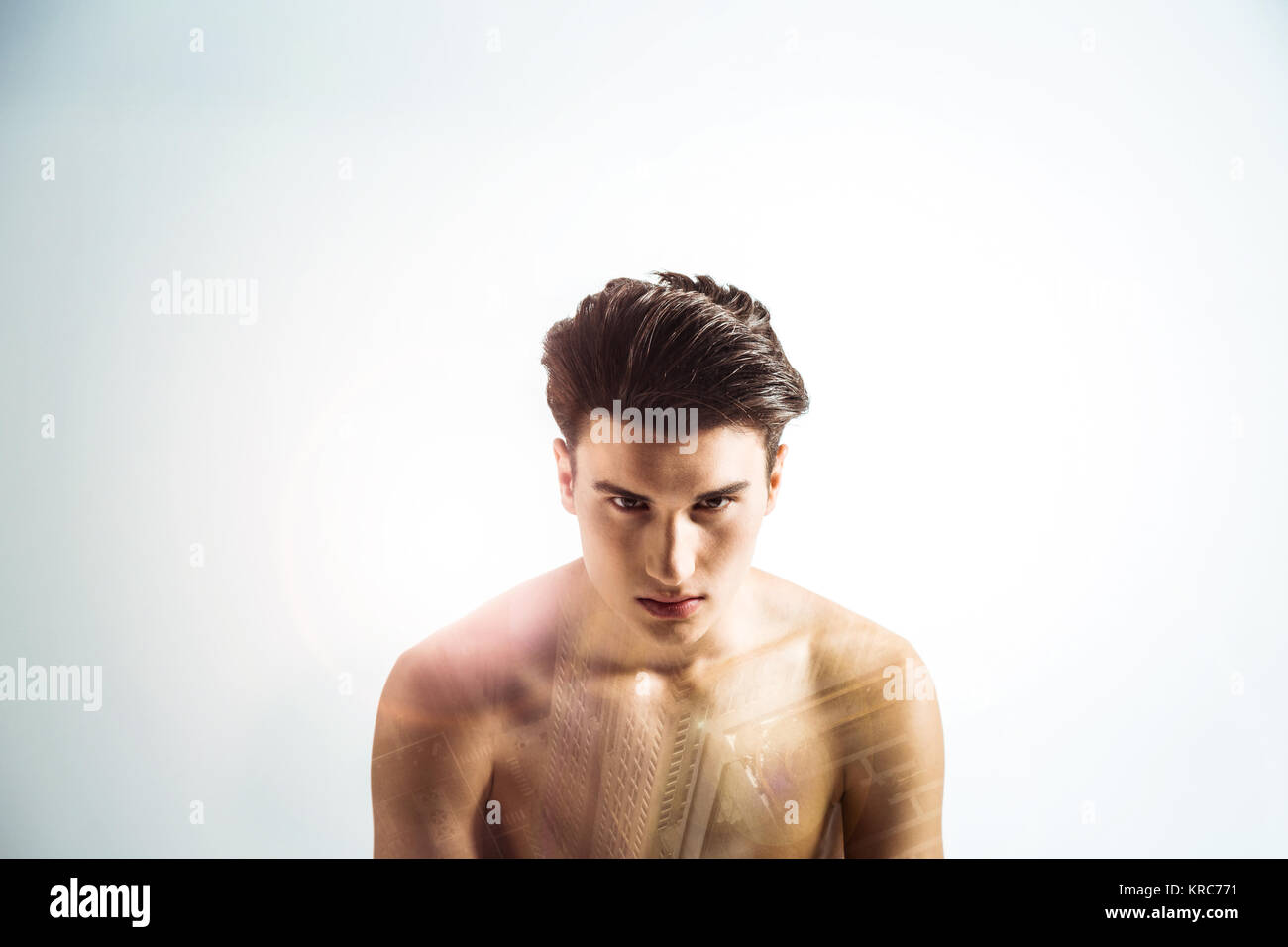 Pleasant handsome man looking in front of him Stock Photo - Alamy