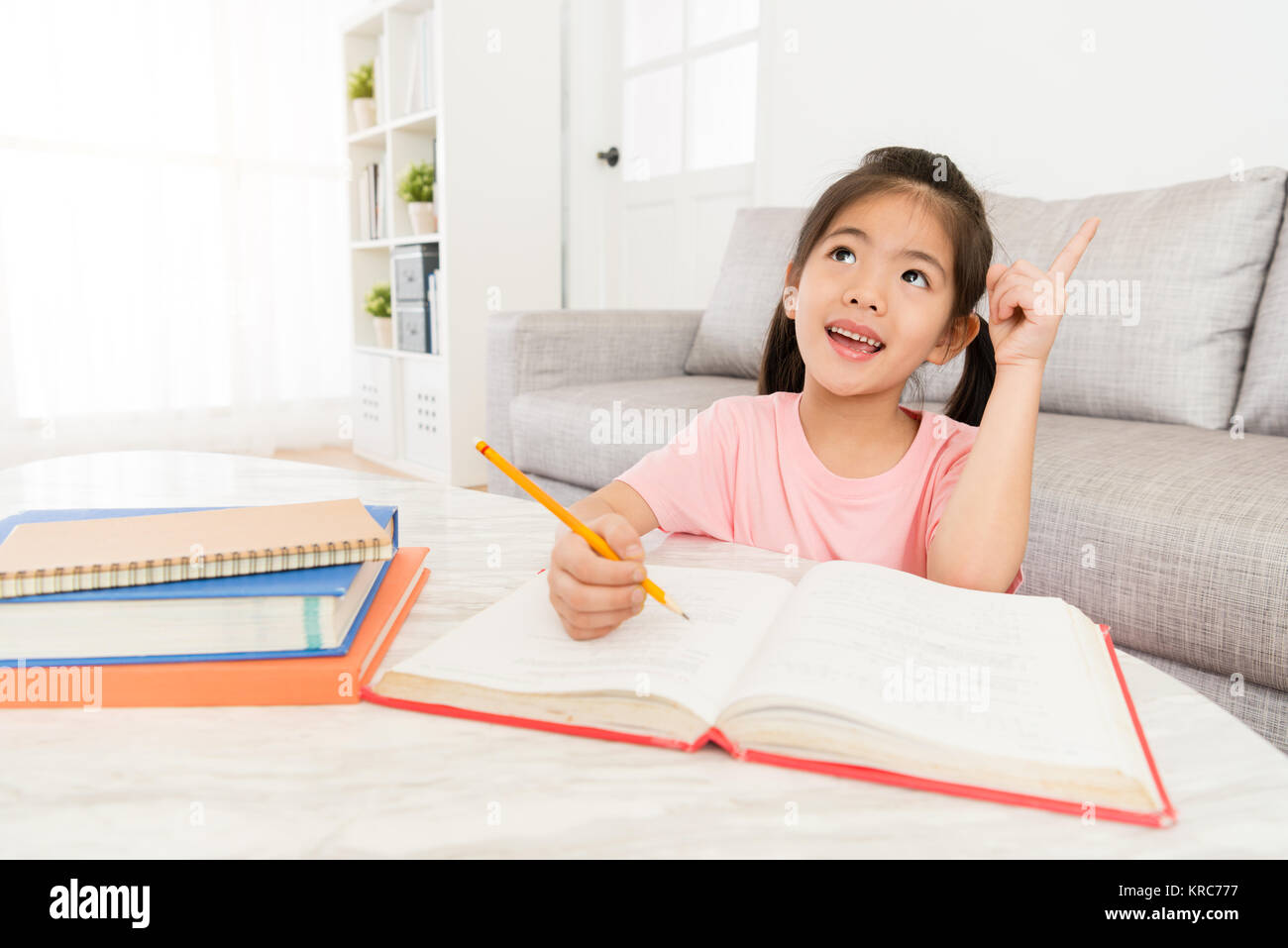 smiling happy girl children writing homework ready back to school ...