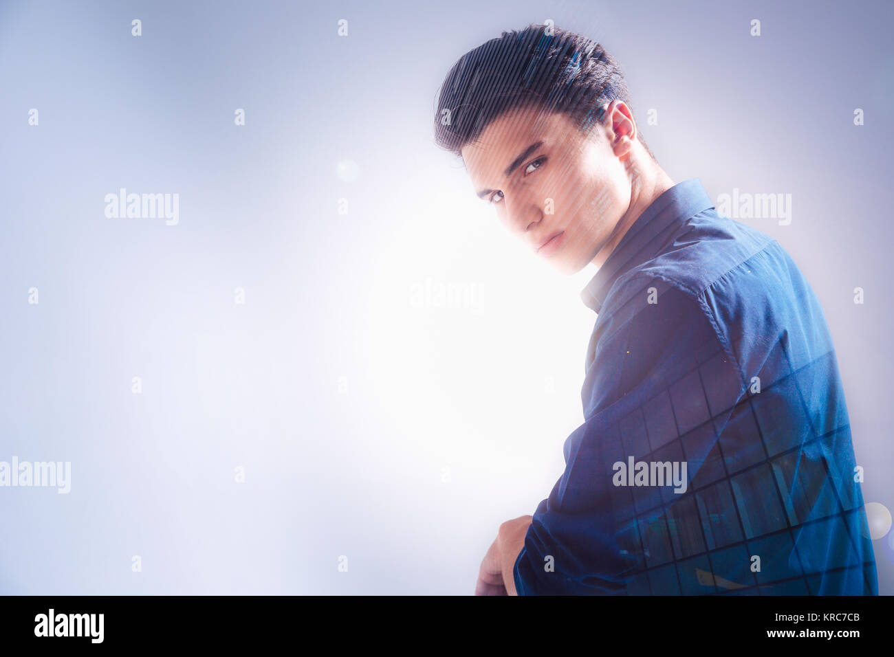 Calm nice man looking at you Stock Photo - Alamy