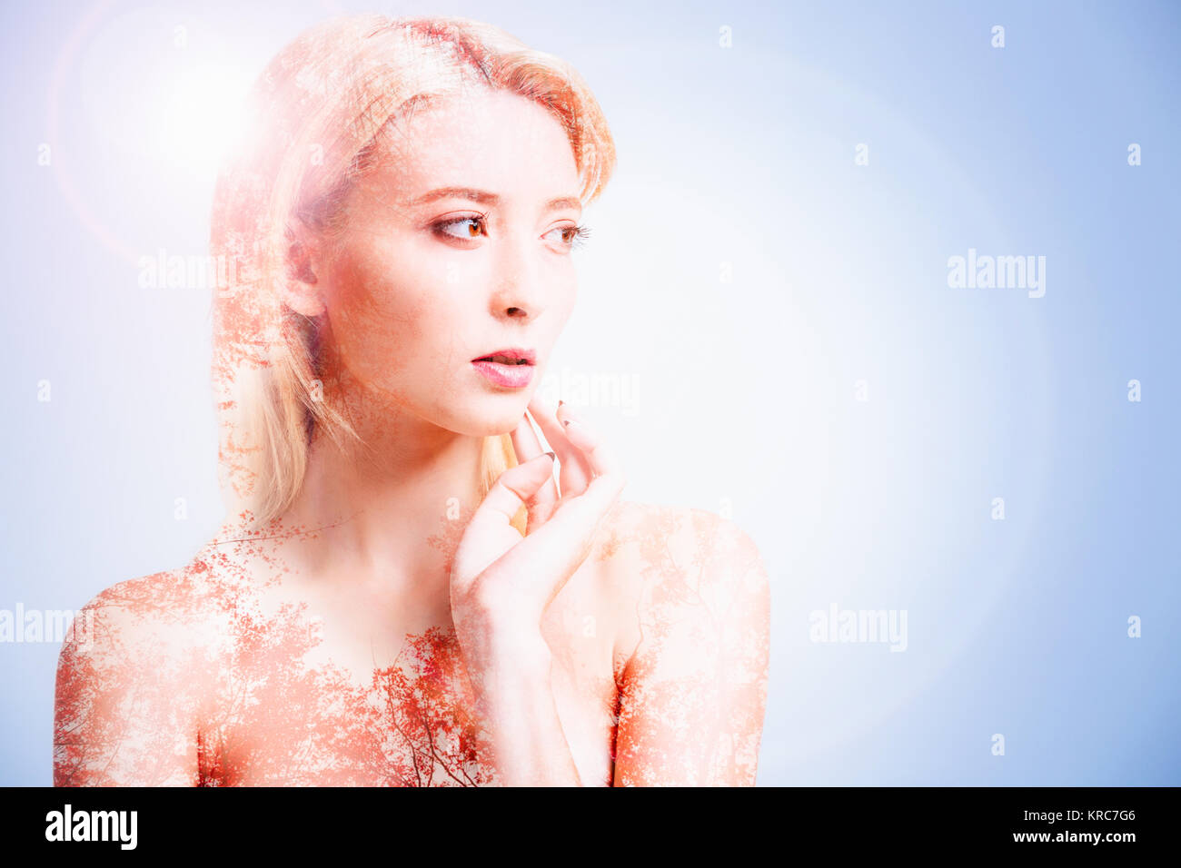 Portrait blonde woman touching cheek hi-res stock photography and ...