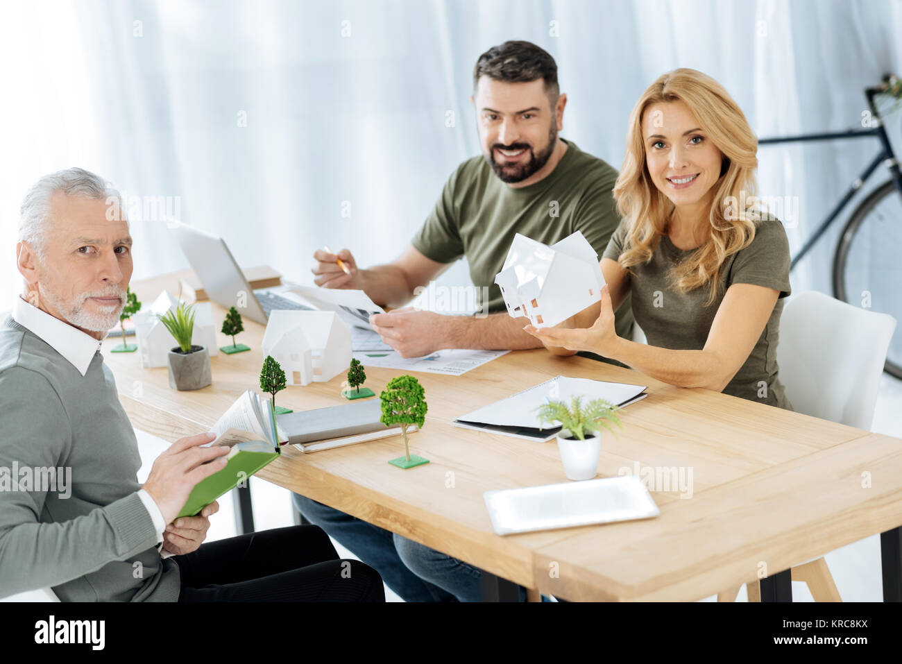 Smart skilled engineers feeling happy while working at their ...
